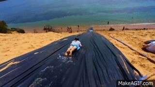 World's Most EPIC Beach Slip N Slide Launch Ramp! on Make a GIF