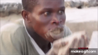 Man eats Sand for Fun on Make a GIF