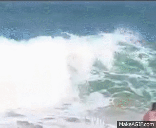 Guy Gets Hit by Wave on Make a GIF