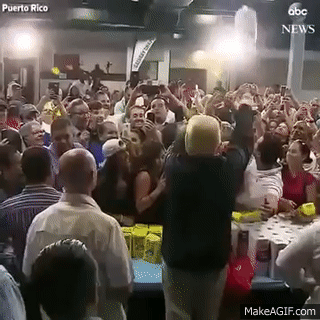 President Donald Trump throws toilet paper rolls at people in Puerto ...