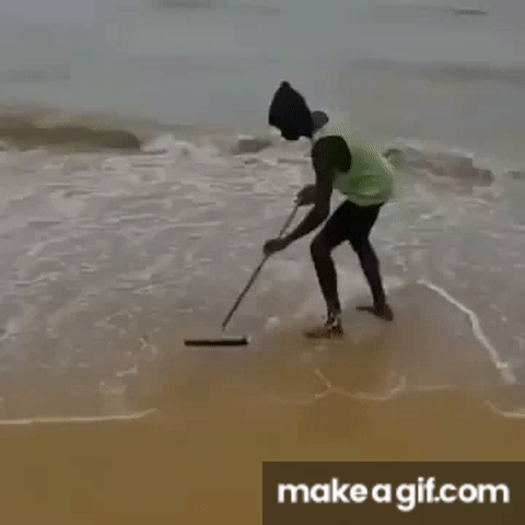 Man sweeping ocean on Make a GIF