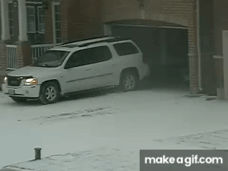 GMC Envoy Spinning Tires on Icy Driveway on Make a GIF