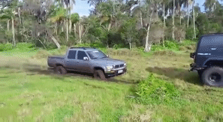 Toyota gets stuck in mud, Jeep makes it much worse on Make a GIF