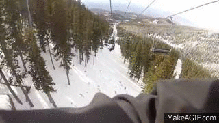 Guy falls off ski lift on Make a GIF