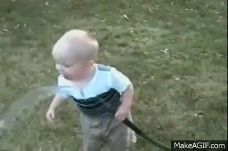 Baby drinks from the hose (funny and cute) on Make a GIF