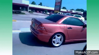Why car wheels rotate backwards in movies on Make a GIF