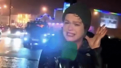 Reporter hit by Stop Sign on Make a GIF