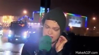 News reporter gets hit by stop sign on Make a GIF