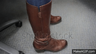 Woman tapping her feet in brown boots on Make a GIF