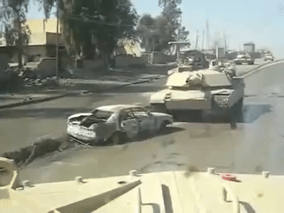 Tank rolls over a bomb on Make a GIF