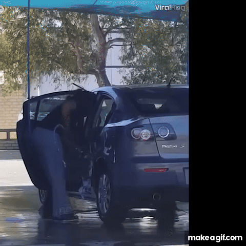 Woman Washing Inside Her Car on Make a GIF