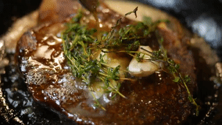 Aged Bone in Ribeye Cooked Medium in a Cast Iron Pan 4k on Make a GIF