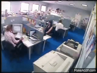 Man getting angry over printer malfunction on Make a GIF