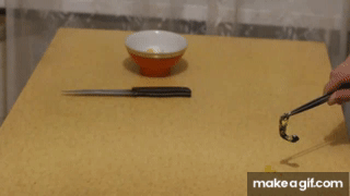 Homunculus smashed by book on Make a GIF