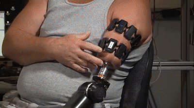 Introducing the world's first Myo-controlled prosthetic arm on Make a GIF