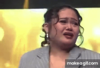 Crying then posing on Make a GIF