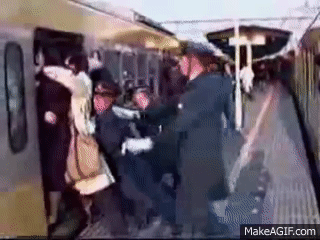 how to load people on a train in japan on Make a GIF