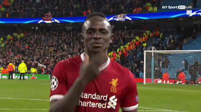 Who is Klopp waving at? Liverpool players celebrate with fans at The ...