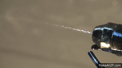 How the fuel oil sprays from the nozzle in the oil burner on Make a GIF