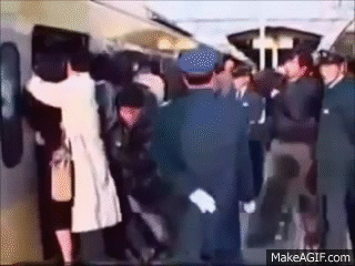 People stuffed onto a train in Tokyo | Japan (train stuffing Tokyo) on ...
