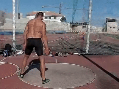 Slow motion Discus Throw Erik Cadee Tenerife November 2011 Side view on ...