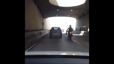 Bad biker get instant karma after kicking a car. on Make a GIF