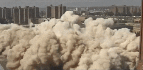 rewinding a demolition - building rebirth on Make a GIF