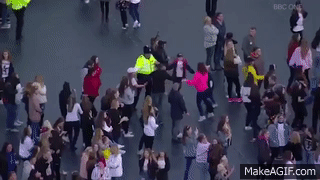 Policeman dances with group of kids! on Make a GIF