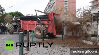 France: Watch farmers spray MANURE at Toulouse town hall on Make a GIF