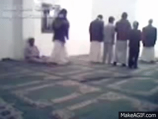 Arab Trips And Fall Down While Pray In Mosque on Make a GIF