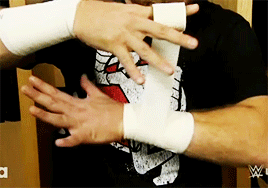 I love seeing wrestlers taping their wrists, because they look... on ...