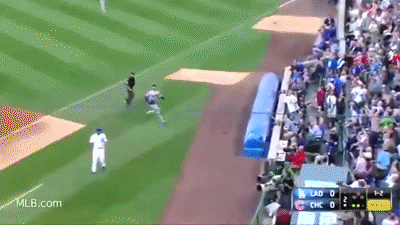 Fan makes amazing catch of foul ball while holding baby on Make a GIF