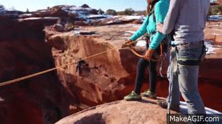 Guy pushes girl off cliff on Make a GIF