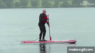Liberal Democrat leader Ed Davey slips off paddleboard into lake on ...