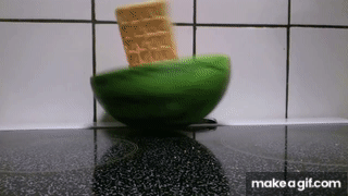 Waffle falling off of a spinning watermelon on Make a GIF