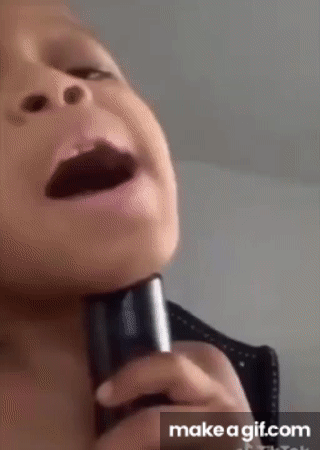 Kid uses grandmas voice box for auto tune on Make a GIF