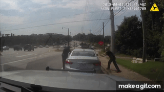 Police officer dragged onto highway during traffic stop and falls into ...