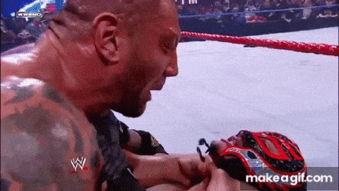 Batista attacks "his friend" Rey Mysterio at WWE Bragging Rights ...