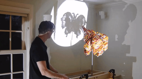 Making shadow art with Legos on Make a GIF