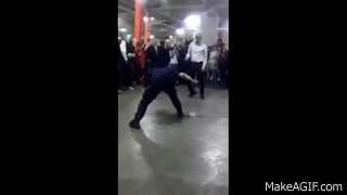 NYPD Cop accepts dance battle against street artist. on Make a GIF