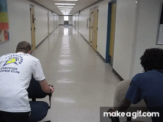 hallway office chair racing on Make a GIF