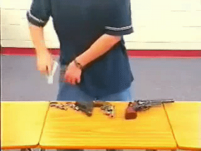 Baggy Clothes - Kid pulls out 10-15 Guns out of his jeans on Make a GIF